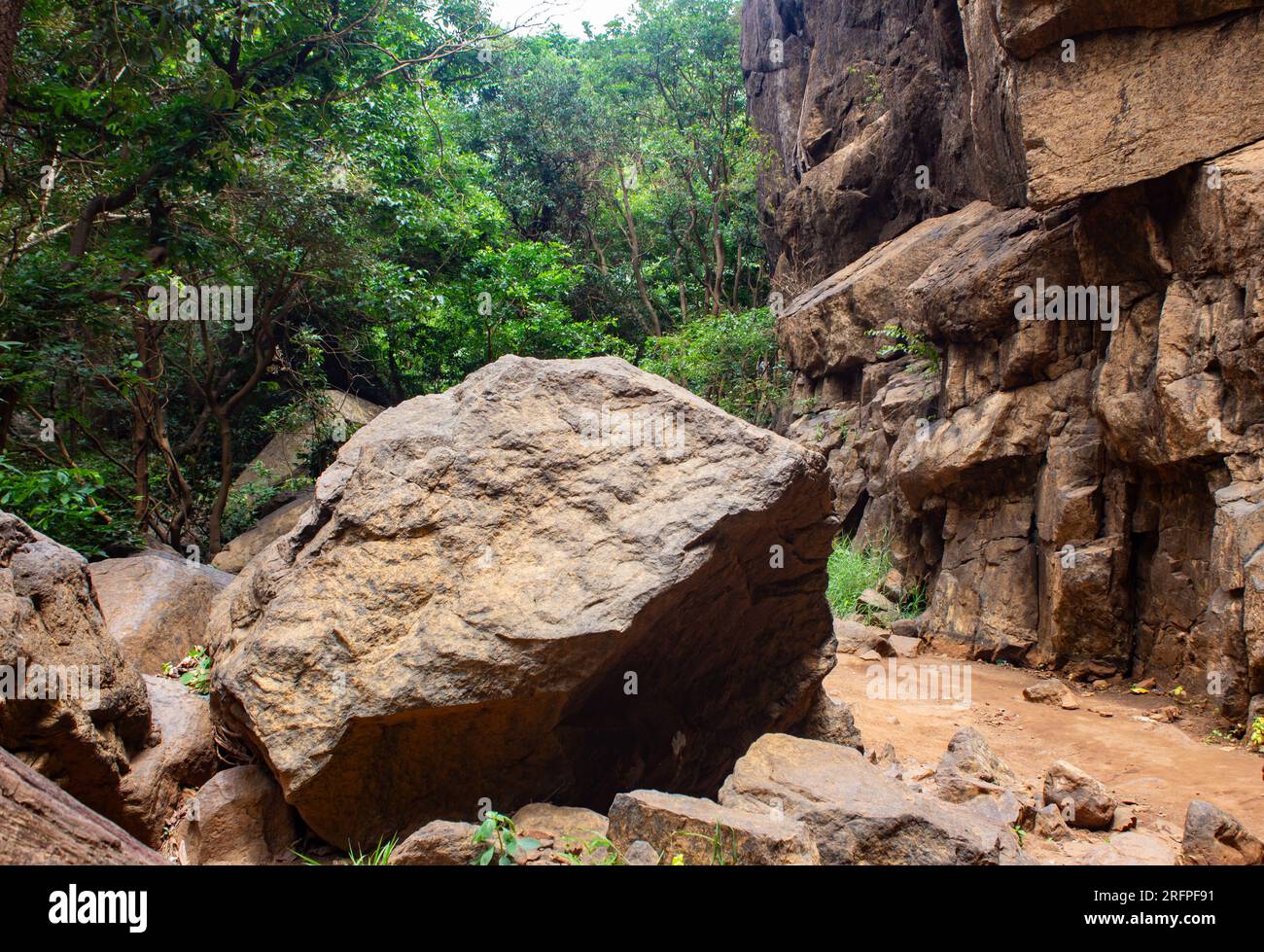 Rocky path on the way to the Agaya Gangai waterfalls located in Kolli ...