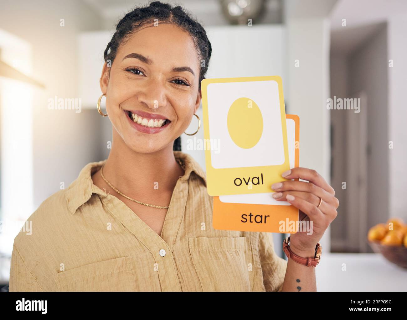 Teacher, video call and portrait of woman with card at home with remote ...