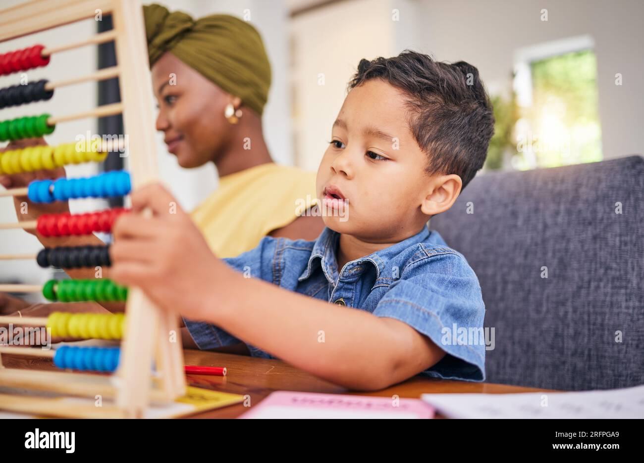 Child, homework and math in home with counting on abacus for ...