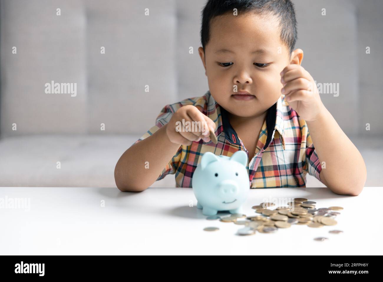 Preschooler child learning to calculate personal budget, manage finance ...