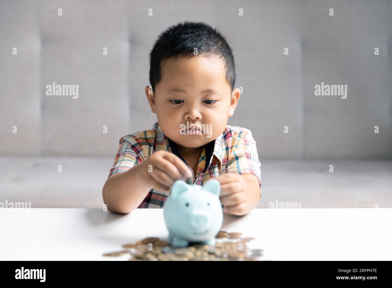 Preschooler child learning to calculate personal budget, manage finance ...