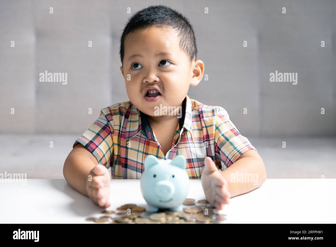 Preschooler child learning to calculate personal budget, manage finance ...