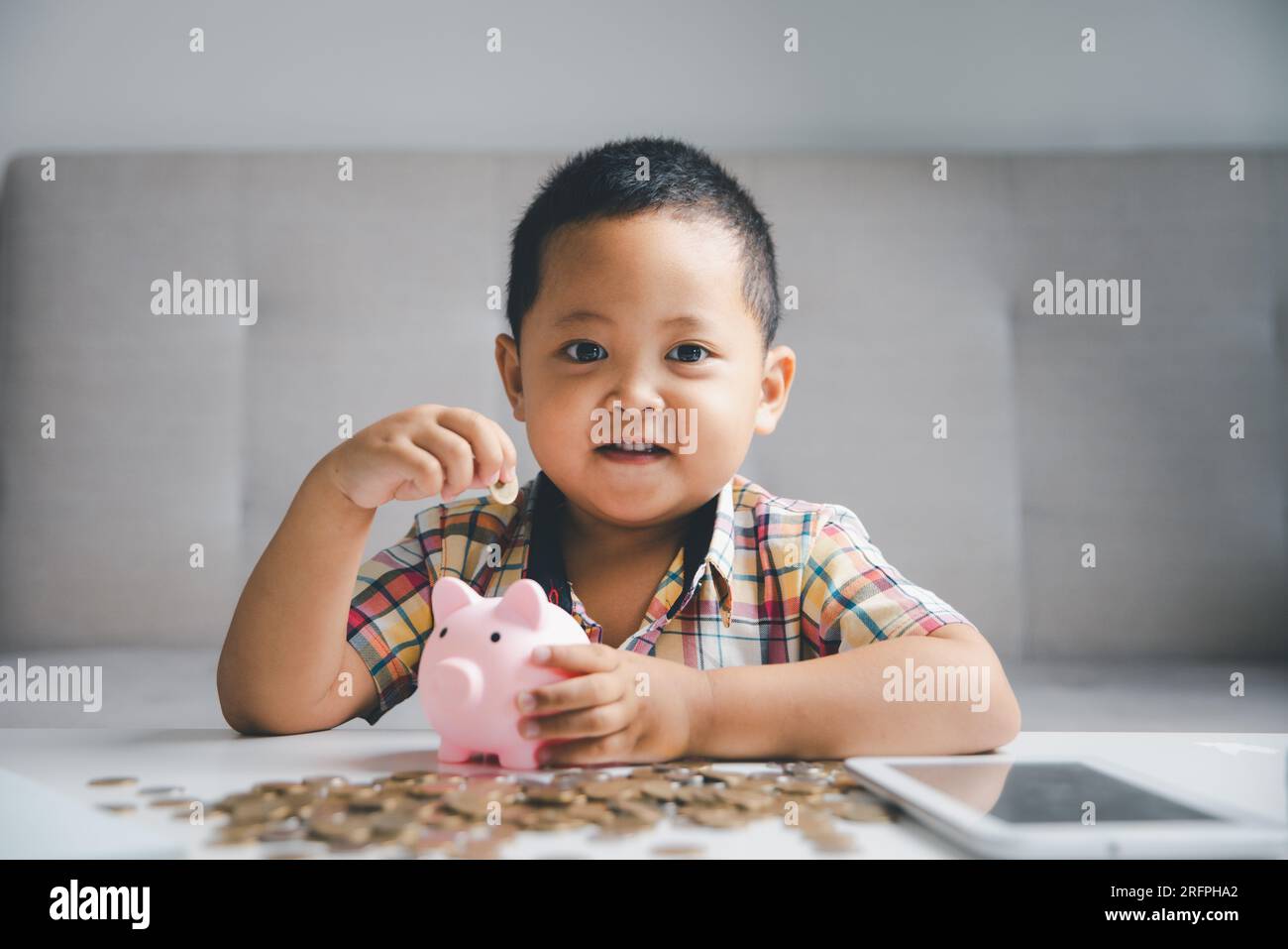 Preschooler child learning to calculate personal budget, manage finance ...