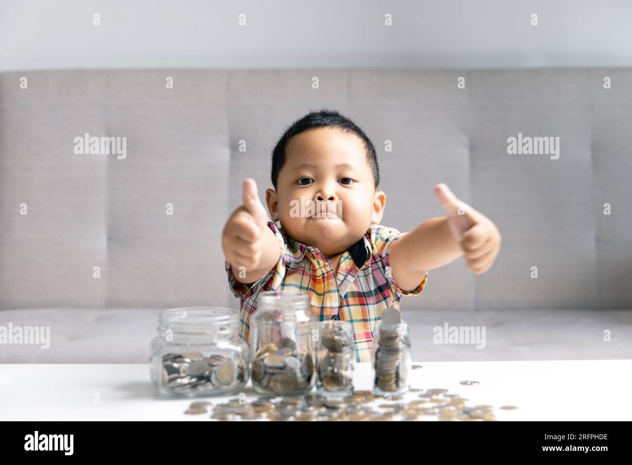 Preschooler child learning to calculate personal budget, manage finance ...