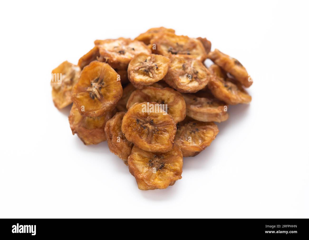 Dried healthy bio banana slices snack on white background.Macro Stock ...
