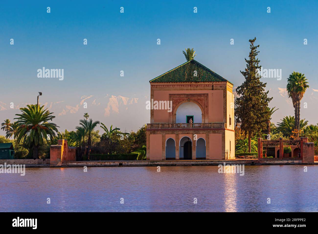Saadian Pavillon at Menara gardens with Atlas mountains in Marrakech ...