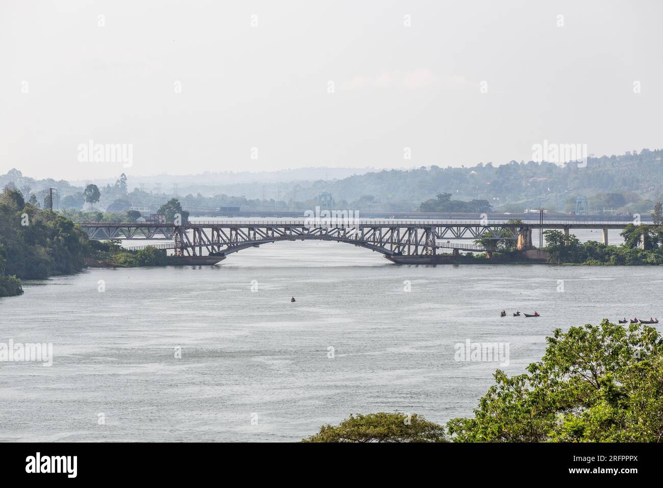View of the Jinja railway bridge spanning the Nile River towards Owen ...