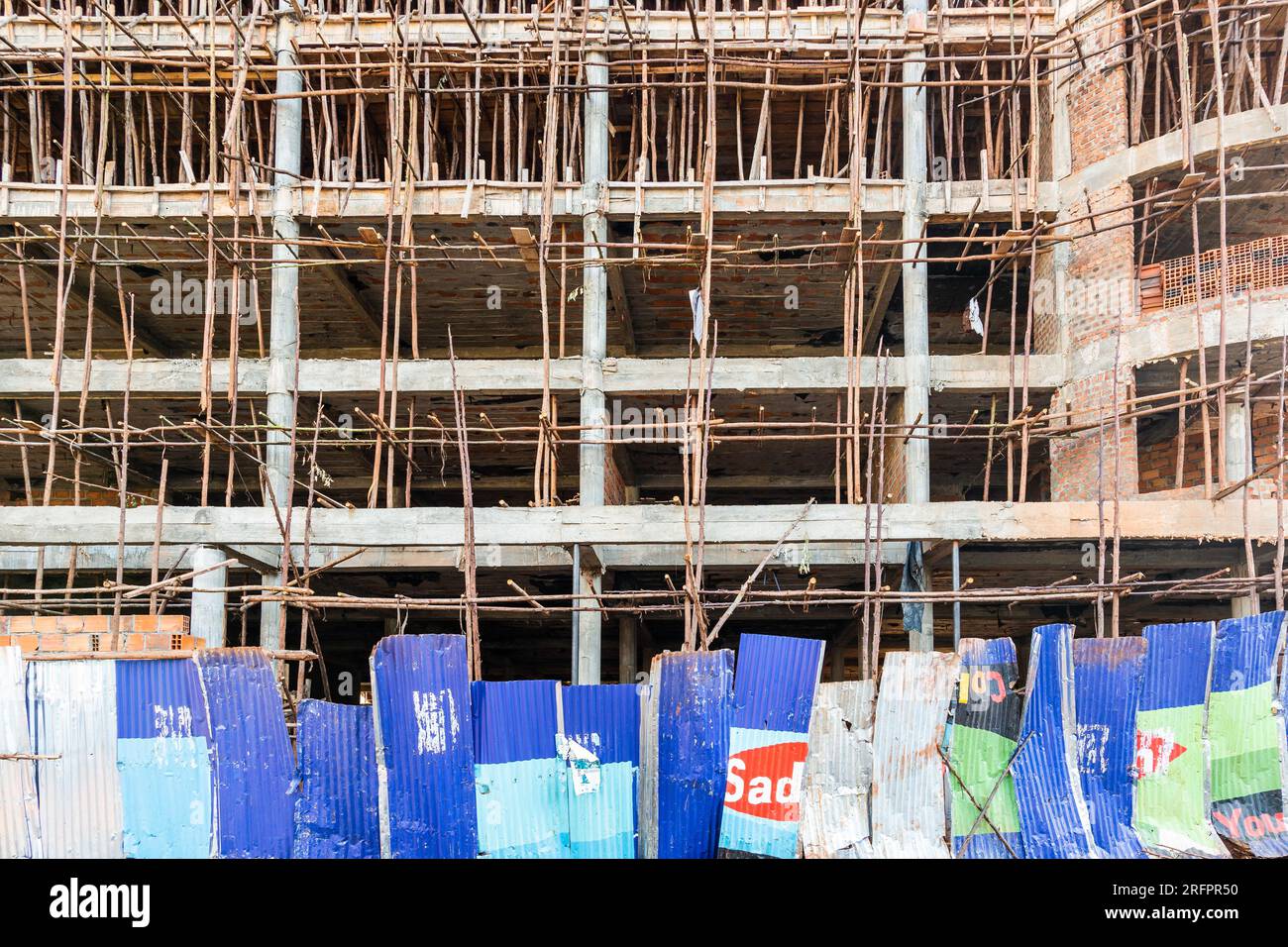 Building under construction, scaffolding made of bamboo, palisade of ...