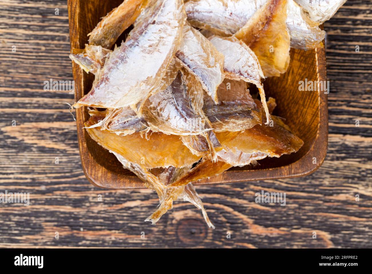 group of small fish gutted and dried with salt, dried and butchered ...