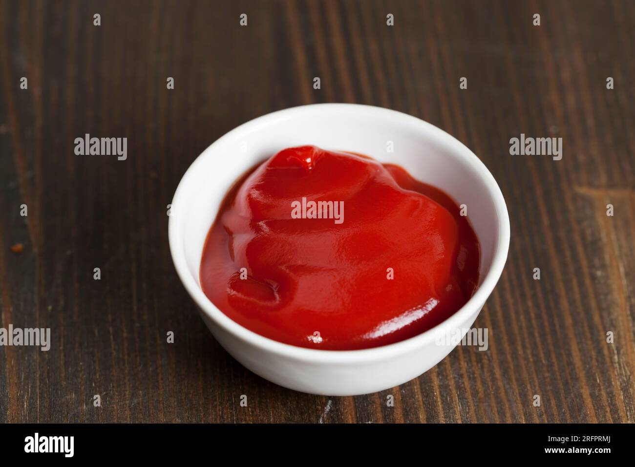 tomato red ketchup poured into a red plate, red ketchup from natural ...