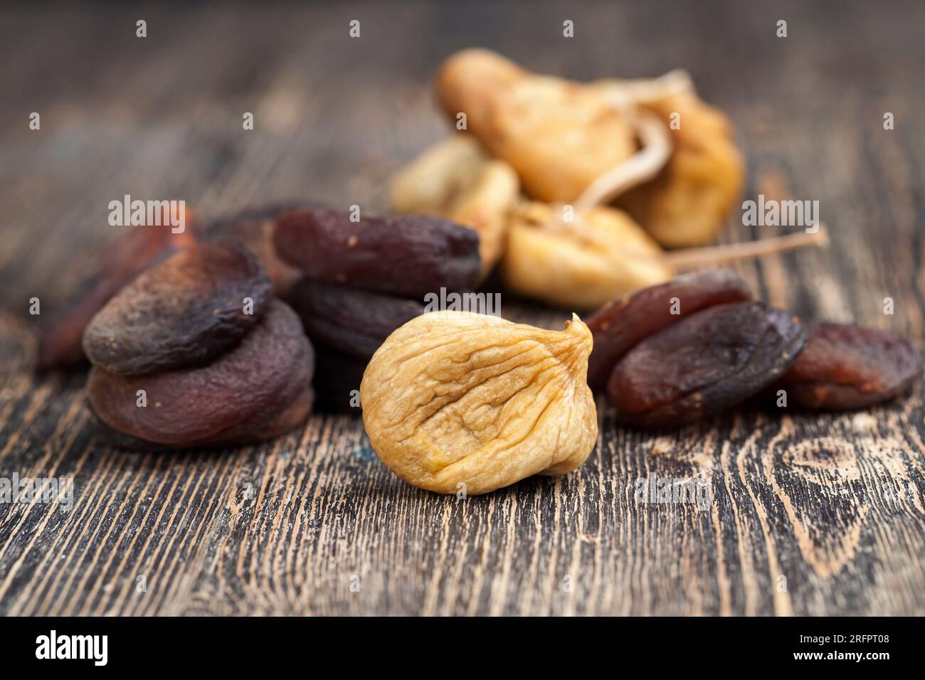 yellow shriveled figs dried to give sweetness, traditional oriental ...