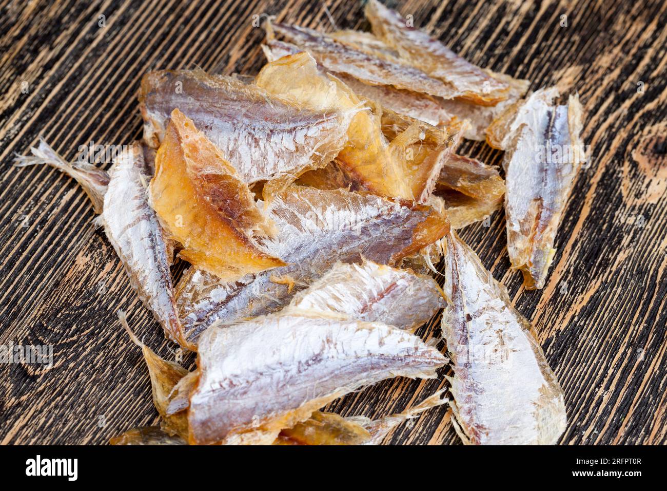 group of small fish gutted and dried with salt, dried and butchered ...