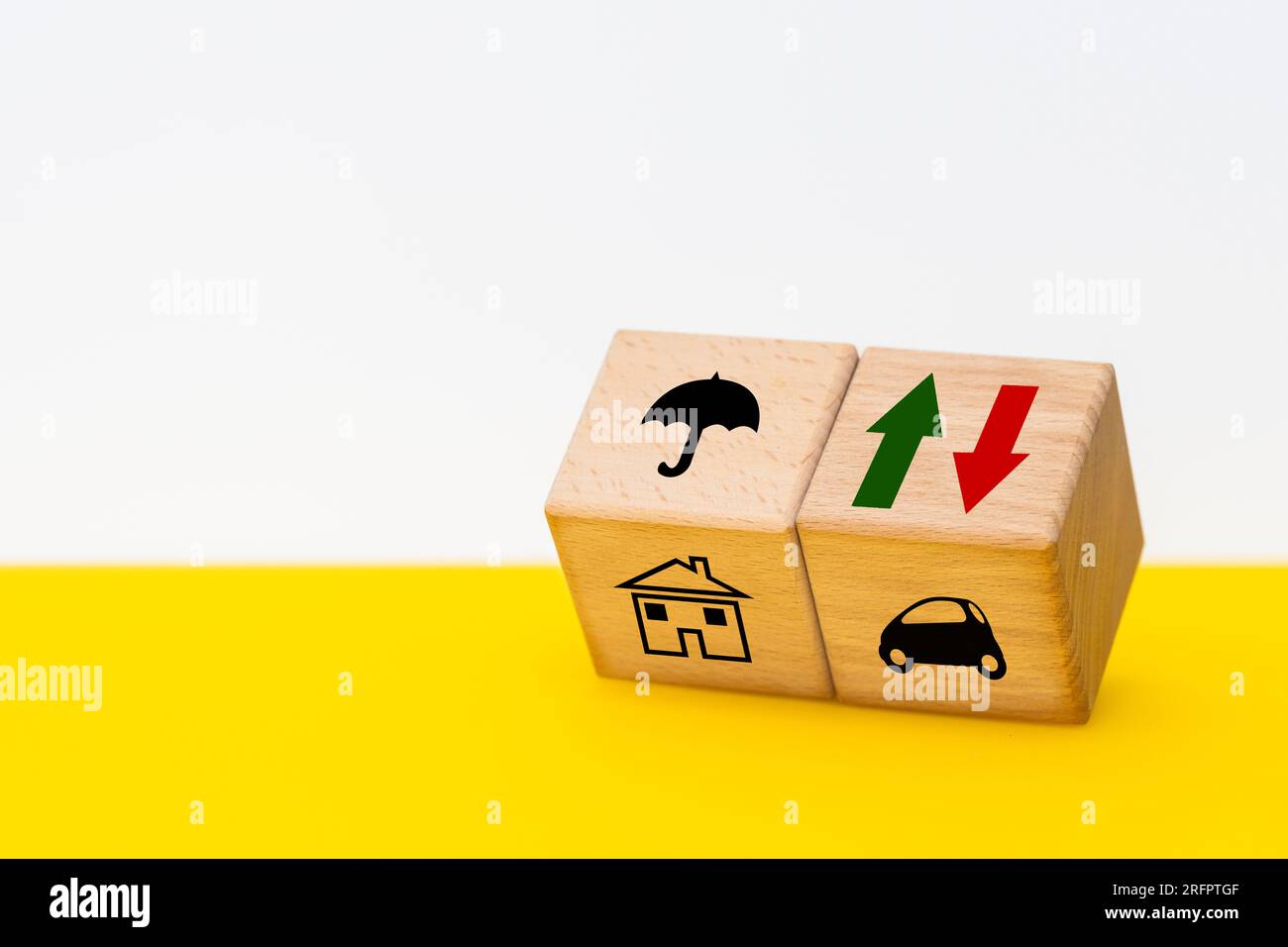 Variable insurance costs, increasing and decreasing, concept, wooden ...