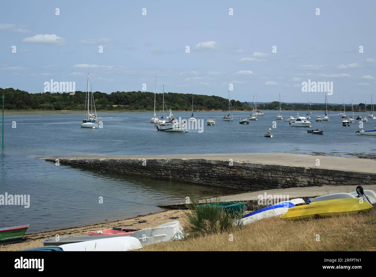 View of boats on beach and River Marle from Embarcadere at Rue Eric ...