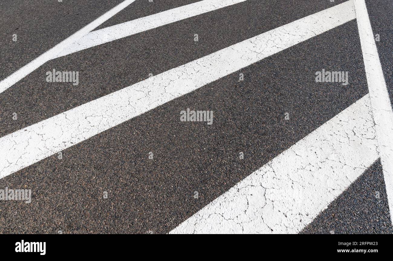 Paved highway with white road markings, traffic regulation using lines ...