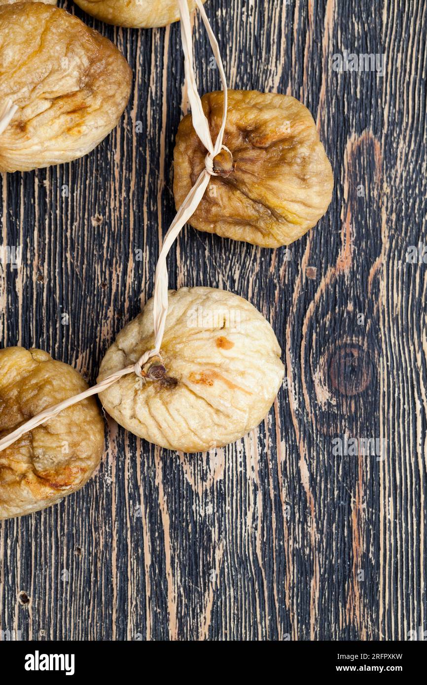 Dried fig fruits on the table, natural sweetness dried ripe yellow figs ...