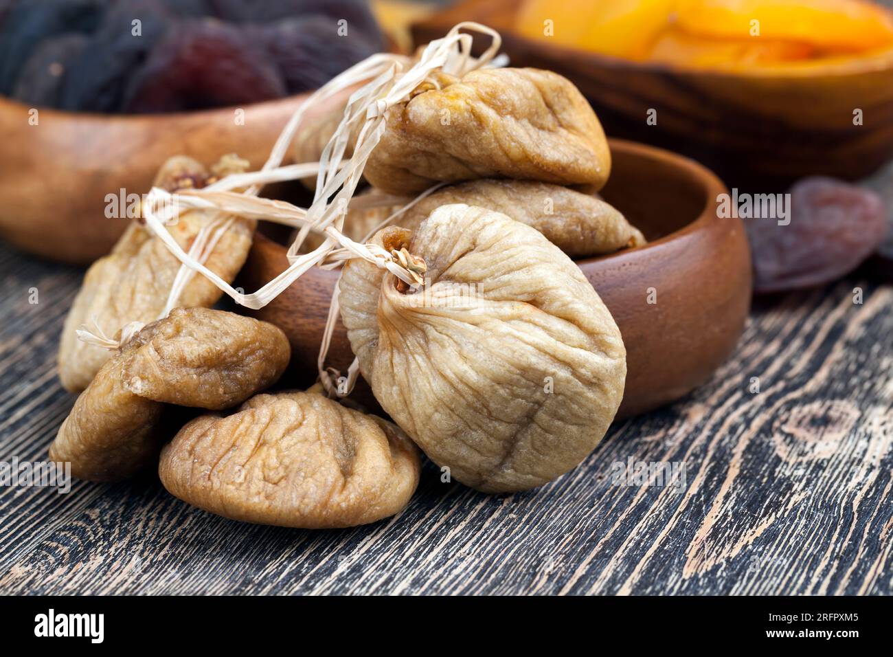 Dried fig fruits on the table, natural sweetness dried ripe yellow figs ...