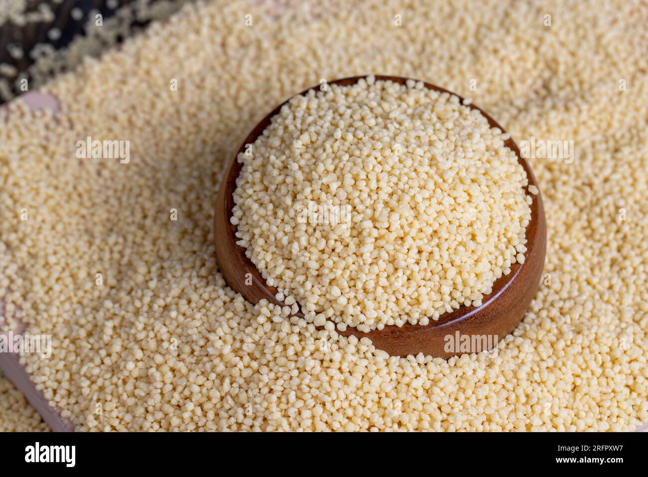 Fresh raw porridge couscous from wheat or millet, cooking dishes from ...