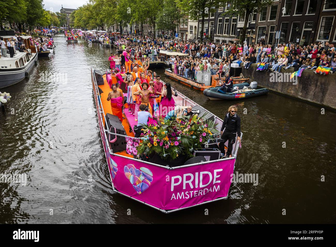 AMSTERDAM - Boats during the Canal Parade. The boat parade with eighty ...