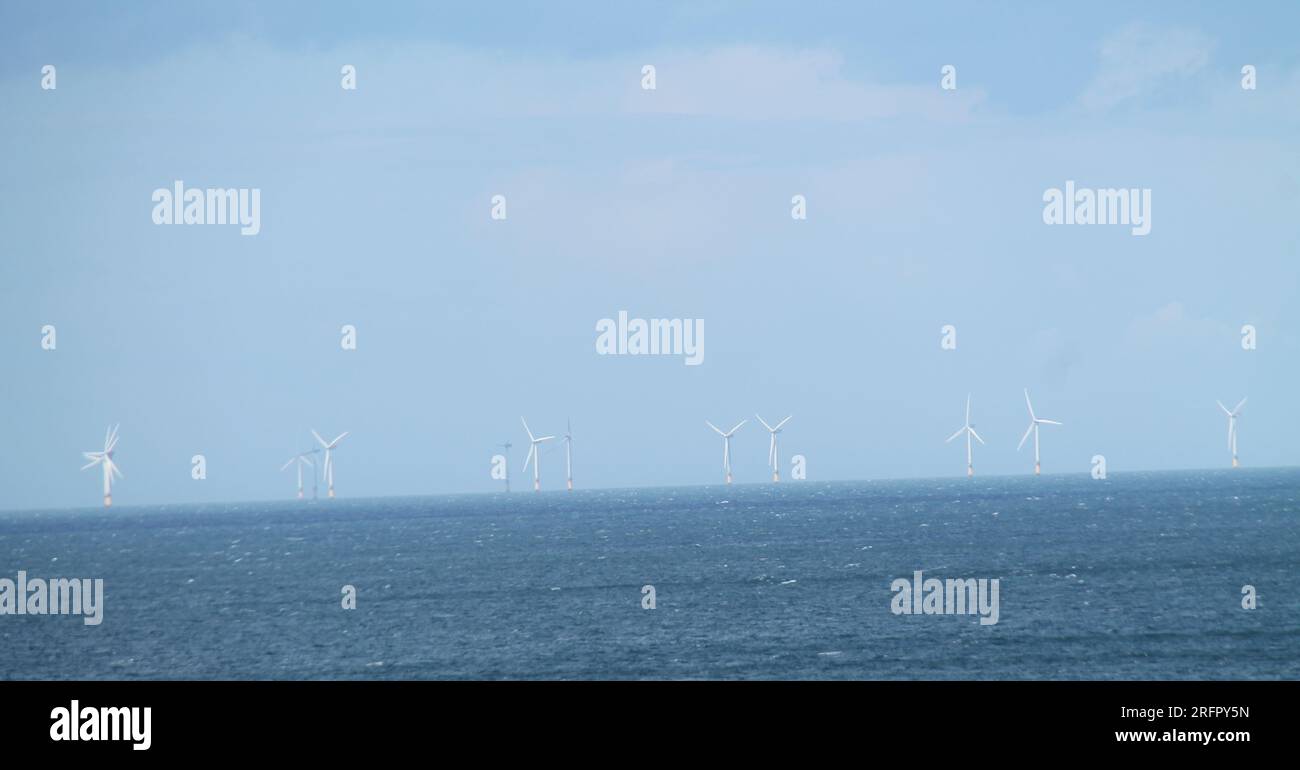 A Collection of Wind Turbines at a Coastal Site Stock Photo - Alamy