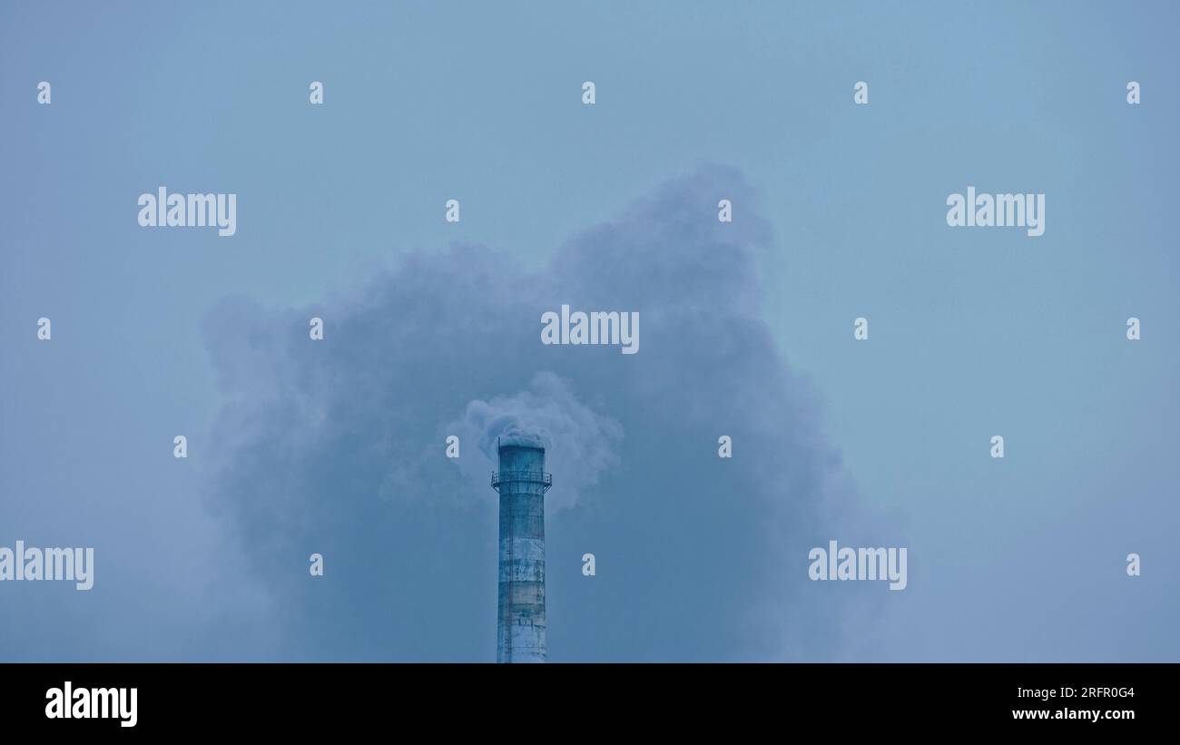 This smoke coming from the chimney in a factory. Harmful emissions into ...