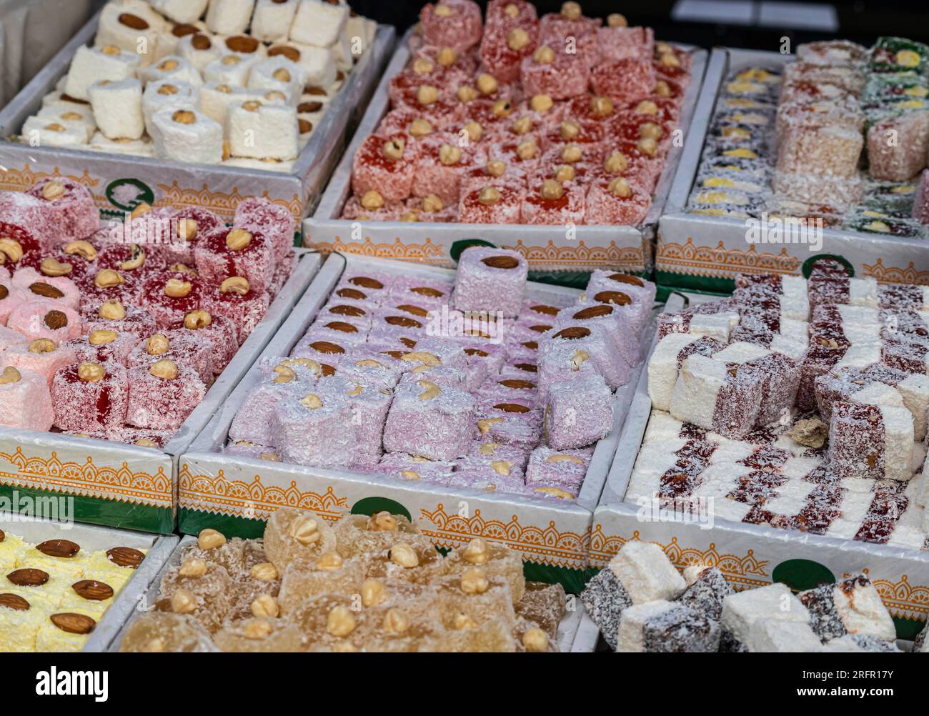 Turkish delight with various fillings, nuts and juice is sold in a ...