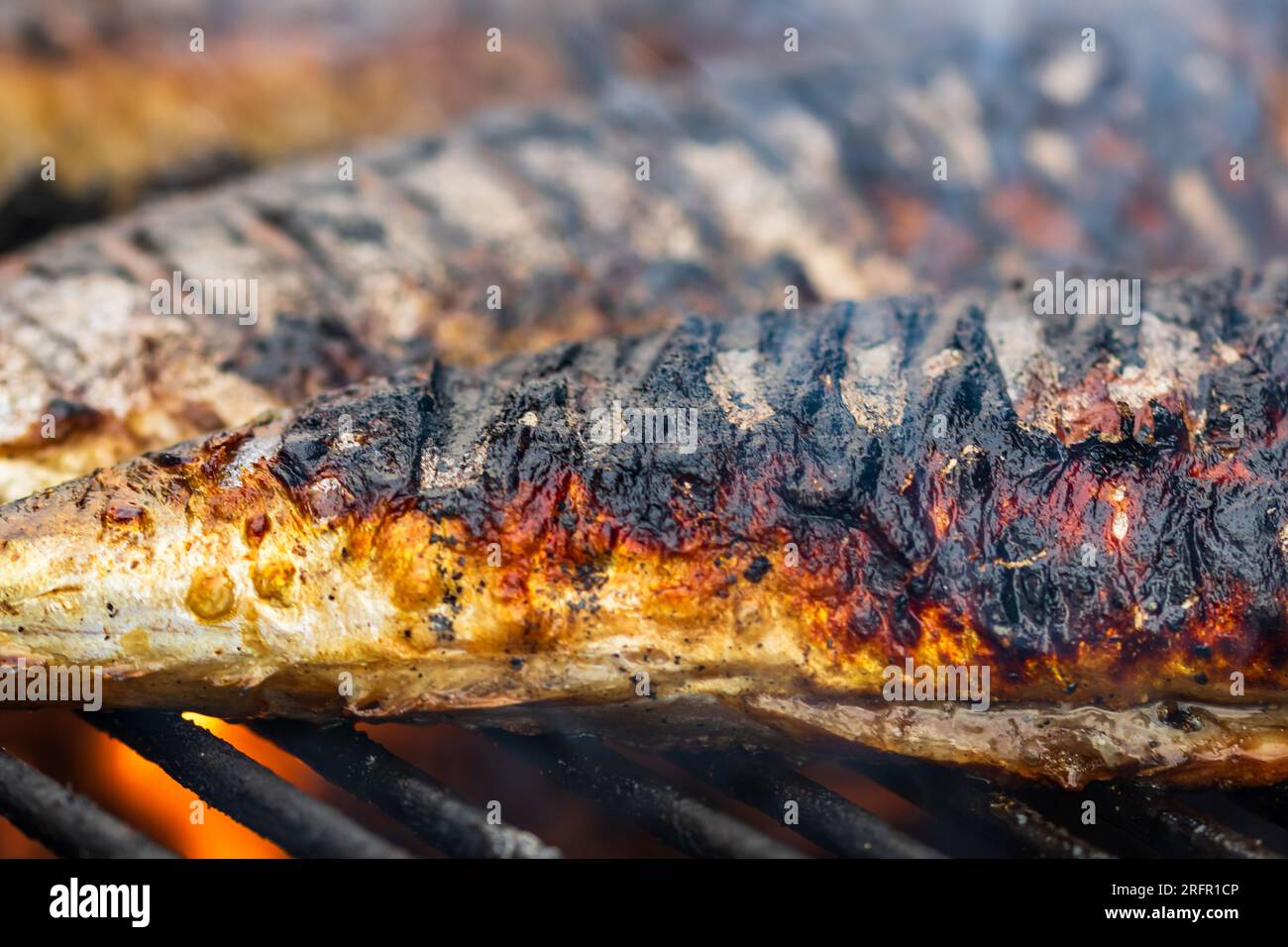 Grilled fish on charcoal grill. Fresh fish barbecue Stock Photo - Alamy