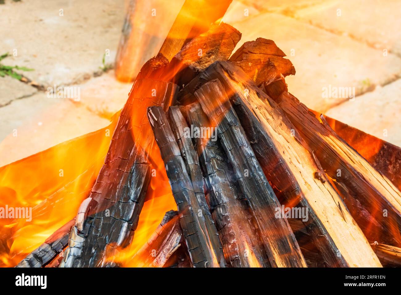 Burning wood chips forming coal. Barbecue preparation, fire before ...