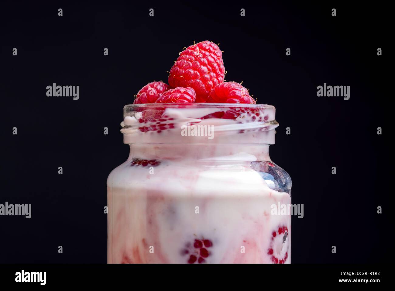 Milk yogurt with raspberries, layered yogurt with raspberry flavor and ...