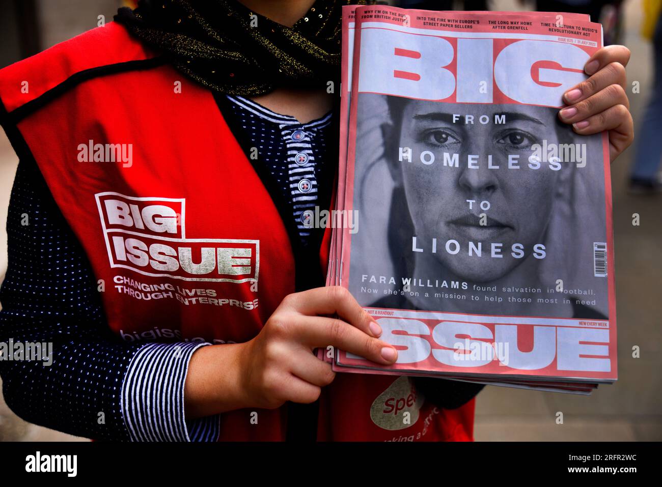 Big Issue seller Stock Photo - Alamy