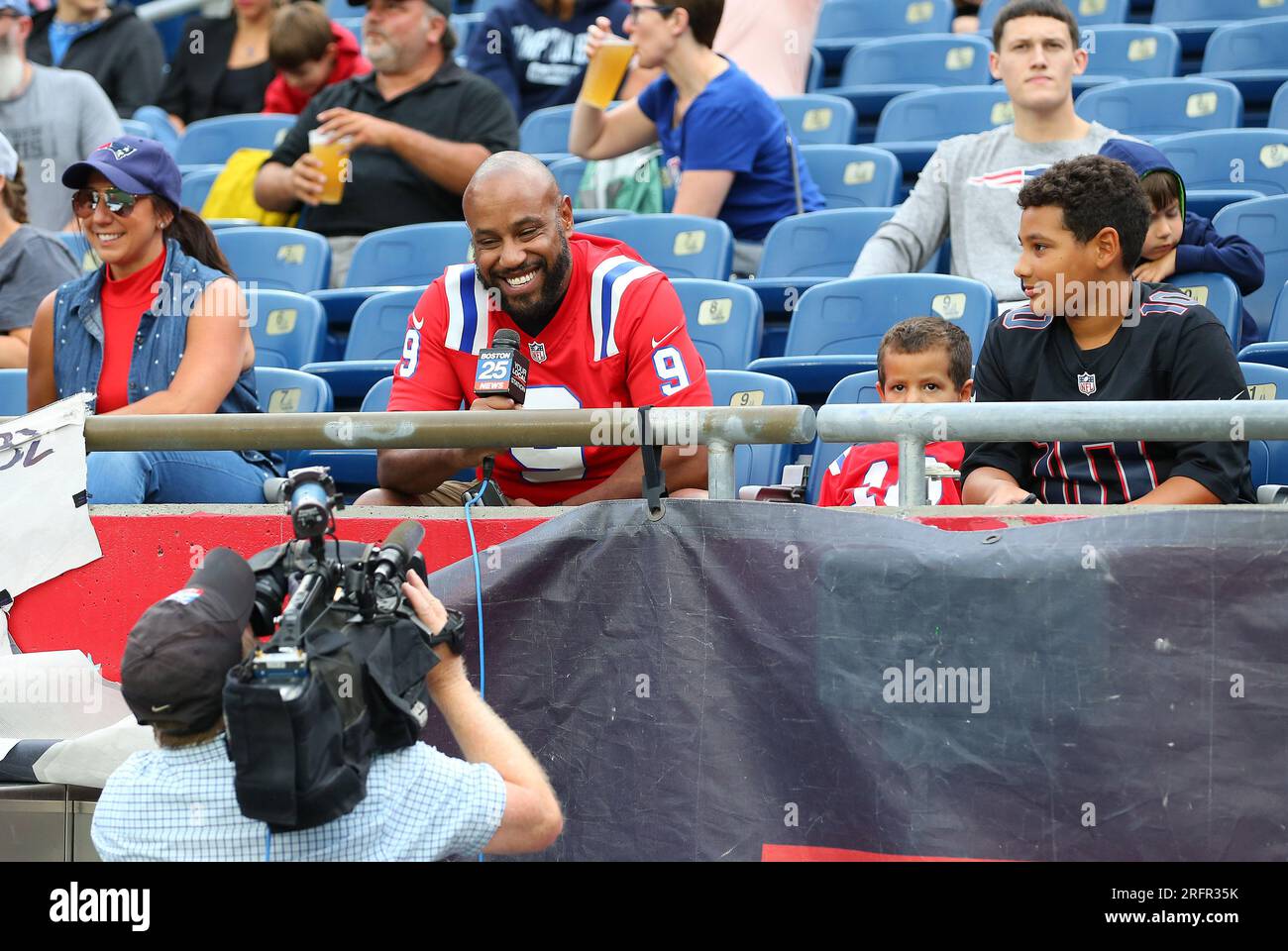 August 4, 2023; Foxborough, MA, USA; A fan is interviewed during ...