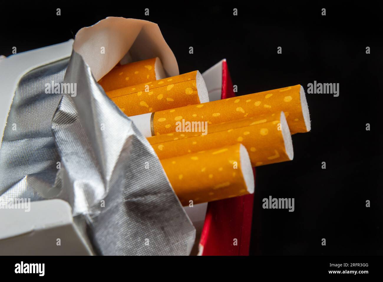 Close up cigarette in pack is addictive to be cancer.smoking reduction ...