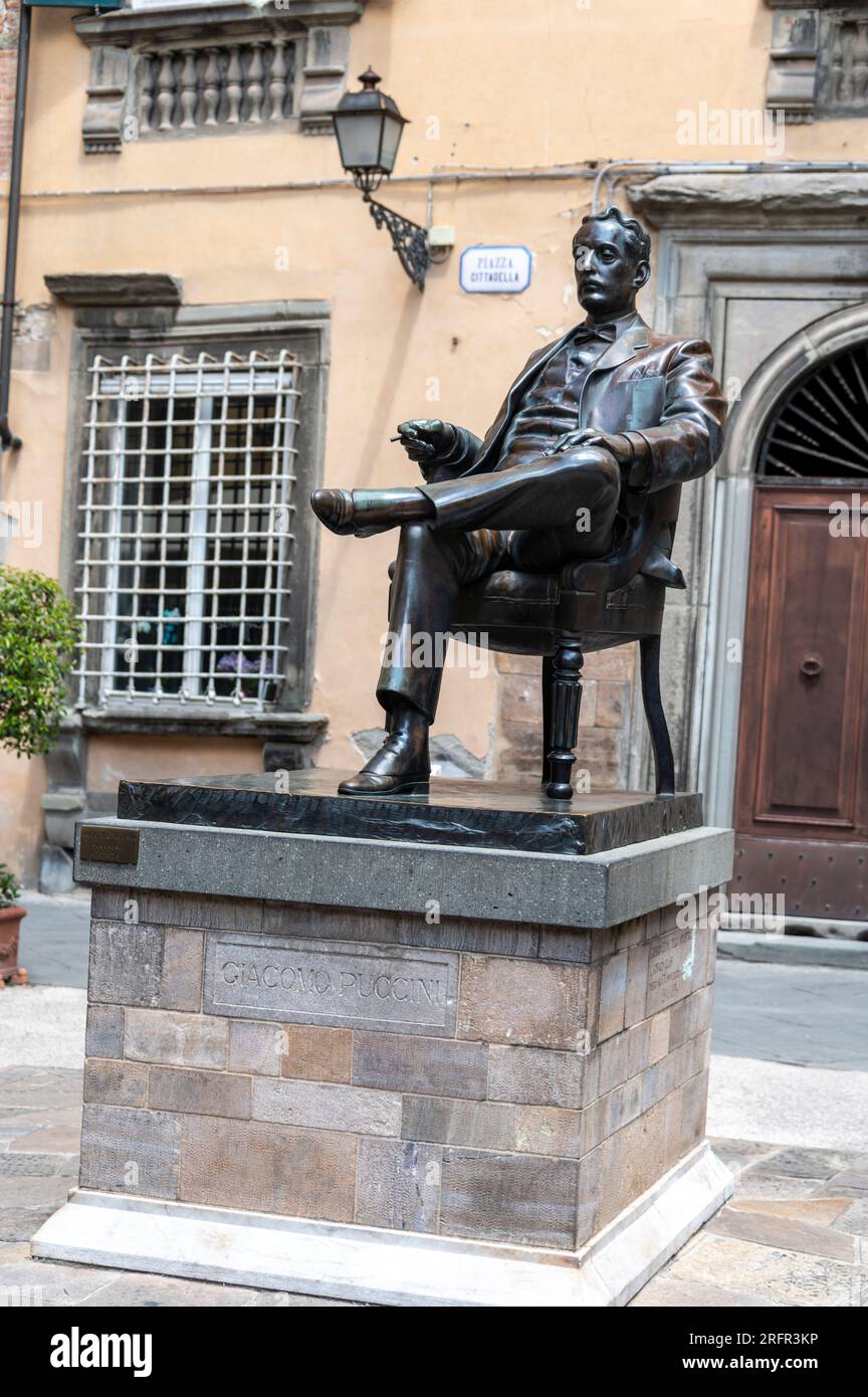 A statue of Lucca’s famous son, music composer Giacomo Puccini on ...