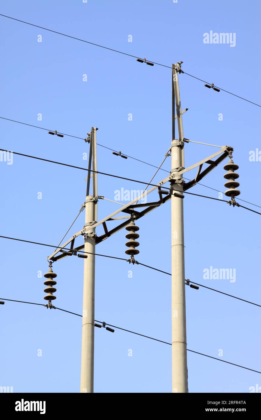 electric wire pole in the blue sky in china rural Stock Photo - Alamy
