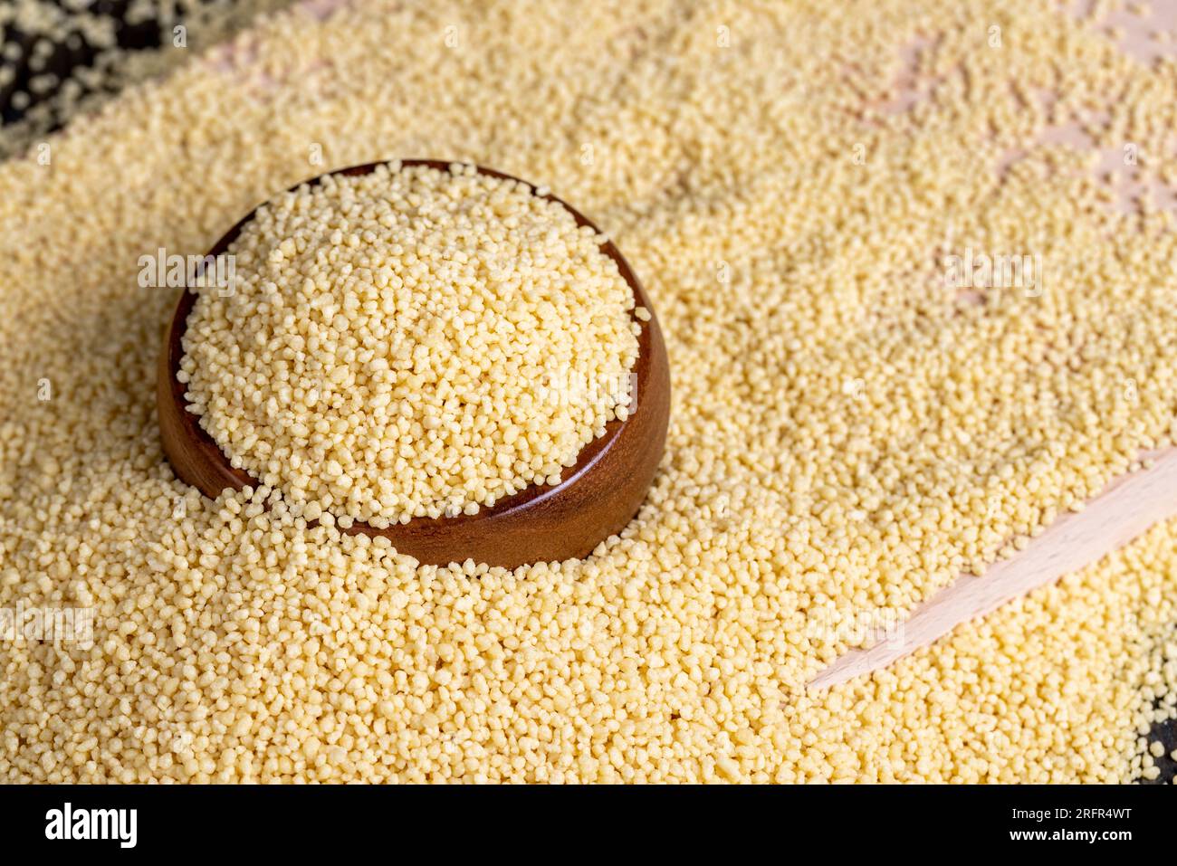 Fresh raw porridge couscous from wheat or millet, cooking dishes from ...