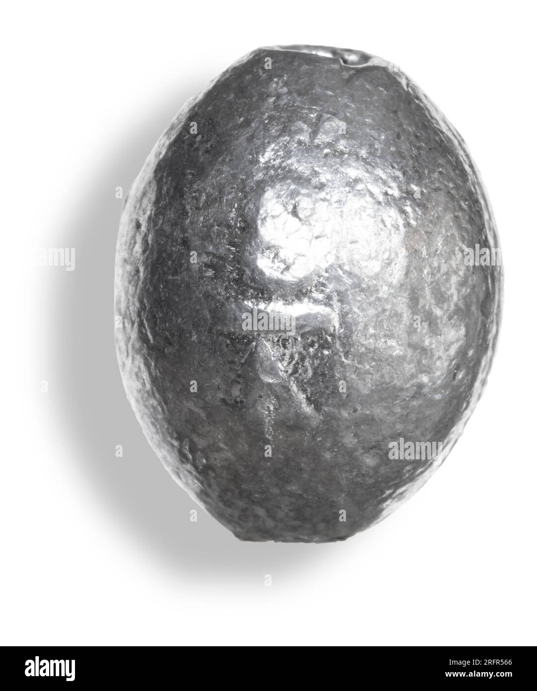 Shadow behind an egg shaped metal sinker that allows line to glive ...