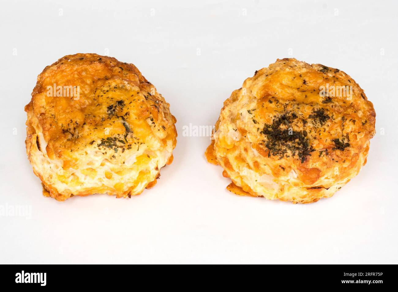 Two cheese scones isolated on a white background Stock Photo - Alamy