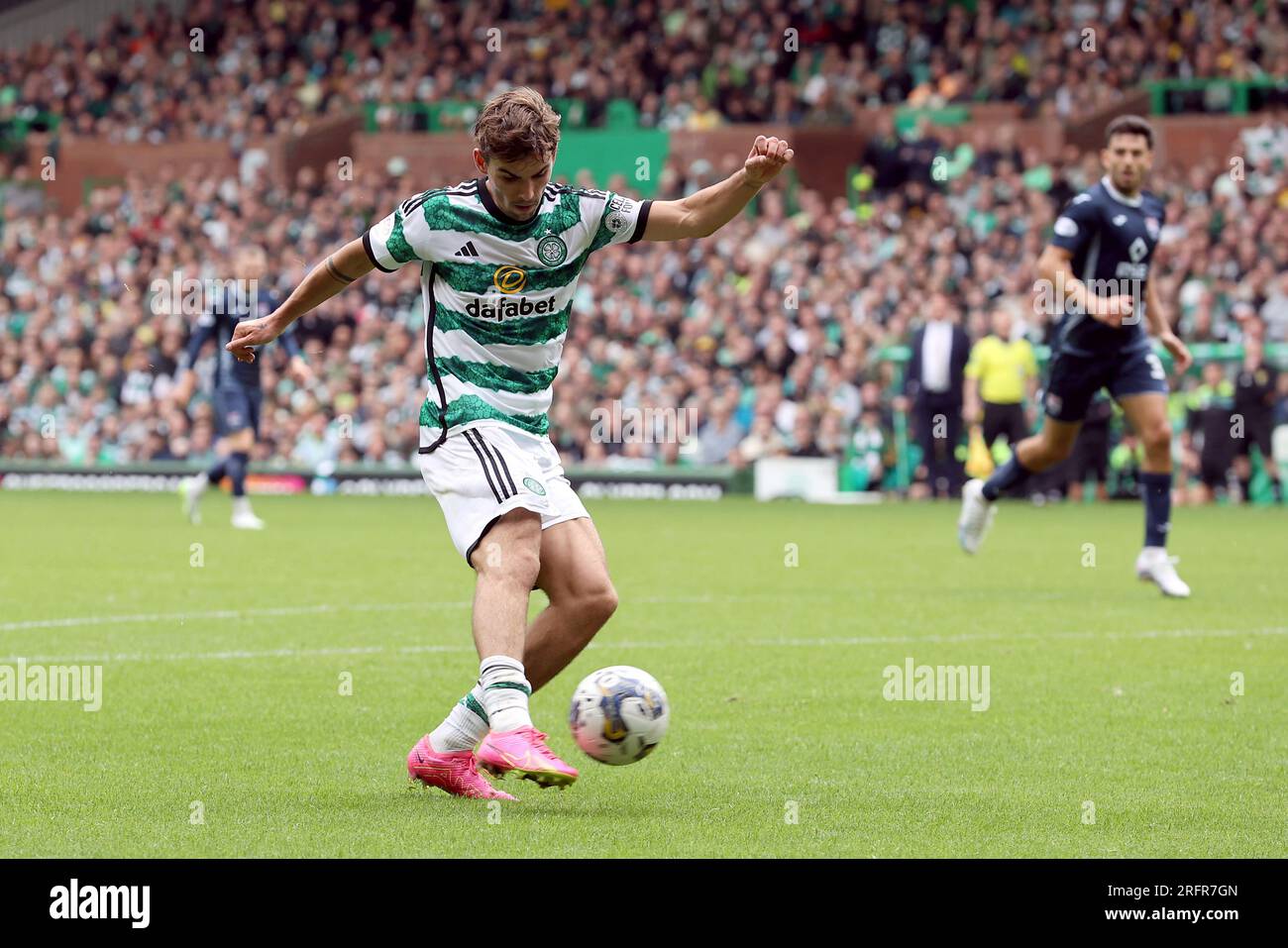 Celtic’s Matt O'Riley scores their side's fourth goal of the game ...
