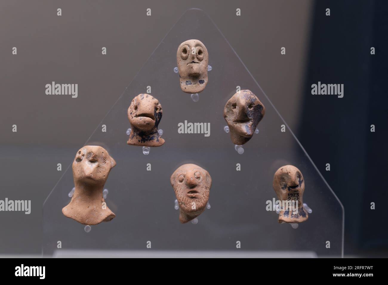 small figurine heads Stock Photo - Alamy