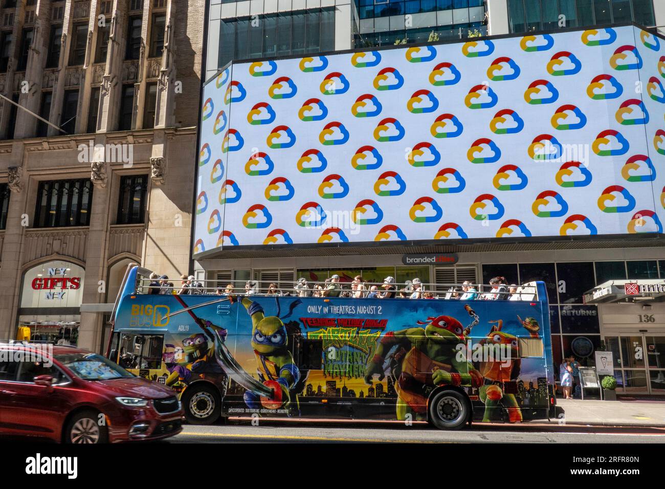 A Double Decker sightseeing bus features a "Teenage Mutant Ninja Turtle ...