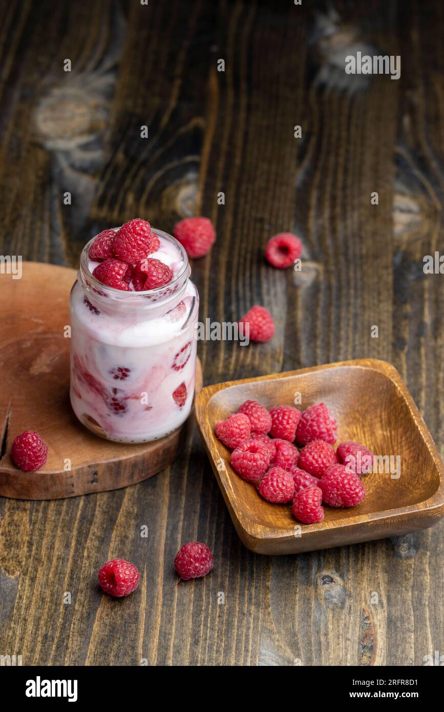 Milk yogurt with raspberries, layered yogurt with raspberry flavor and ...