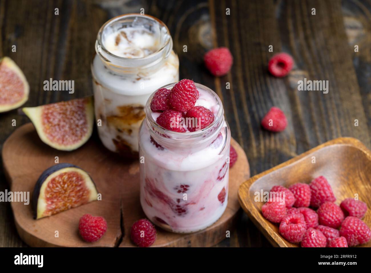 Milk yogurt with raspberries, layered yogurt with raspberry flavor and ...