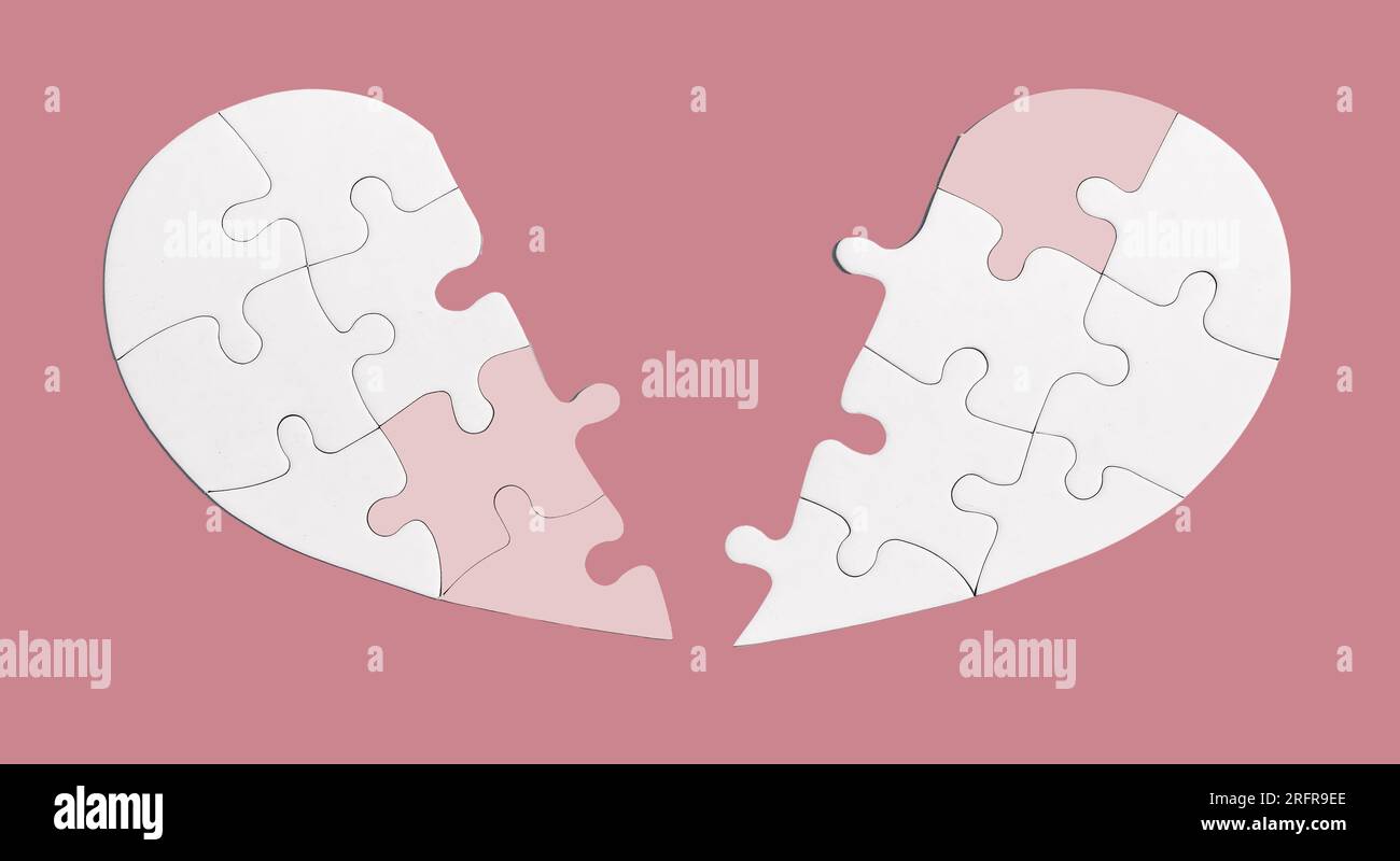 Broken split heart puzzle. Divorce, breakup, heartbreak concept Stock ...
