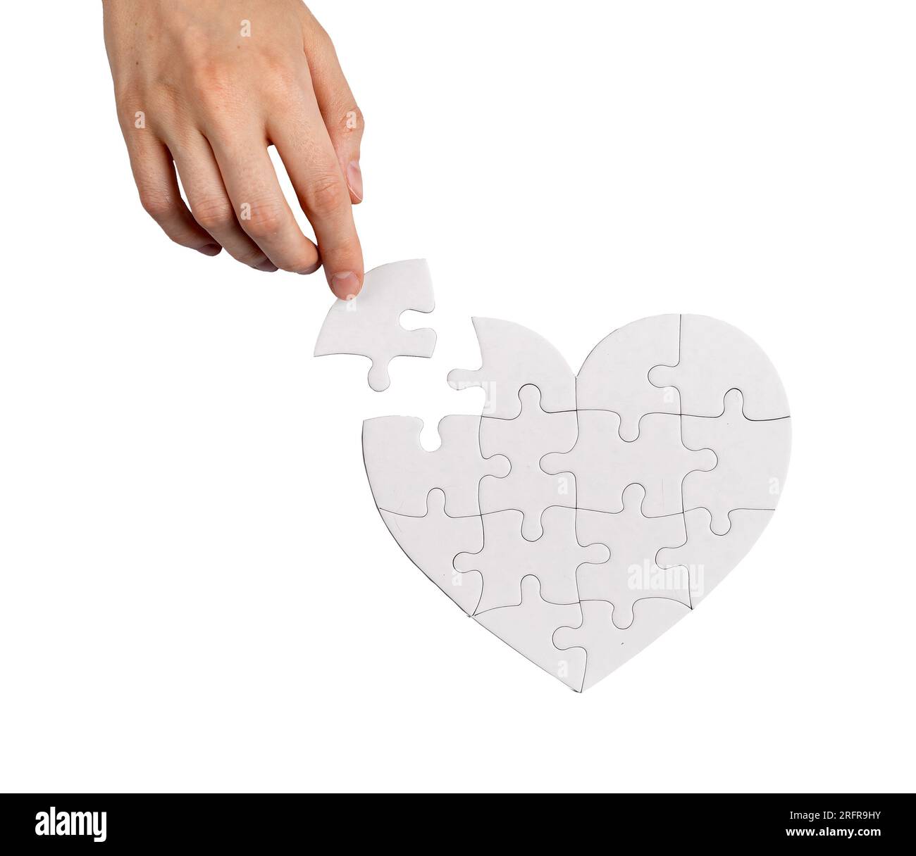 Completing heart shaped puzzle with missing lacking piece isolated on ...
