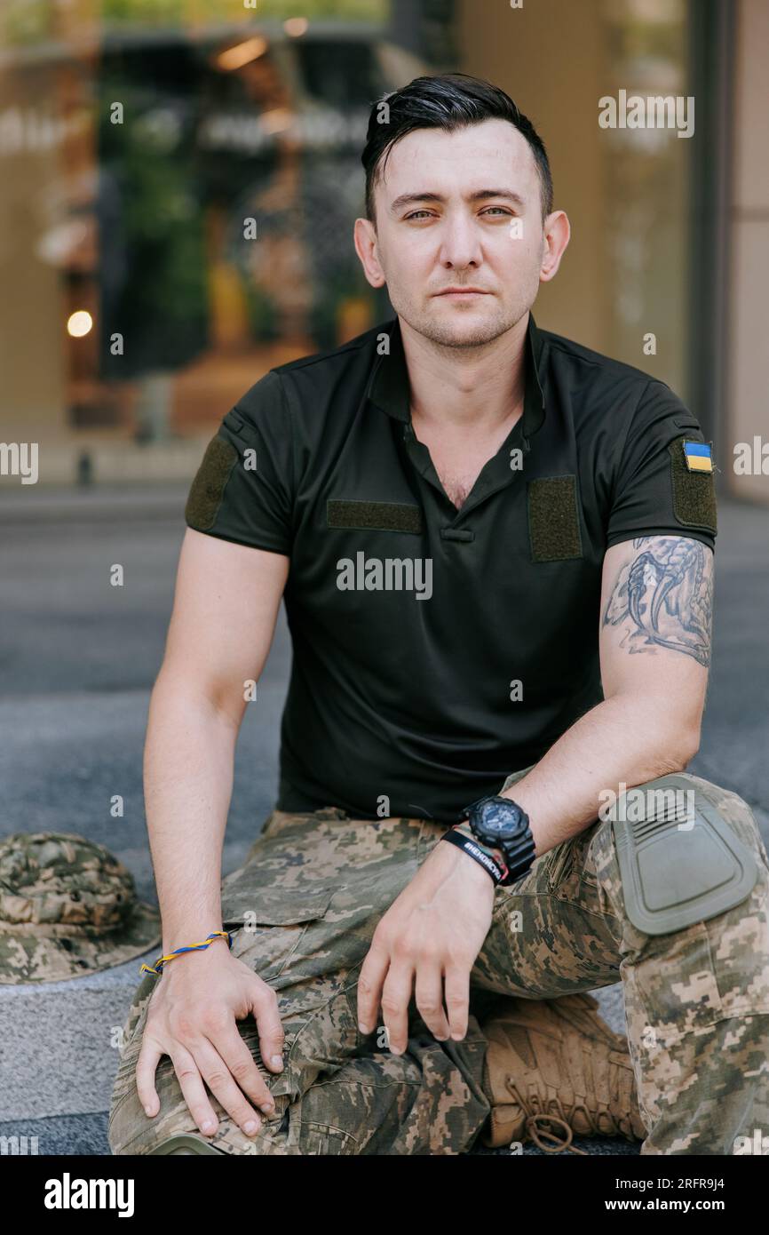 Portrait of Ukrainian soldier returning from the war in his vacation ...