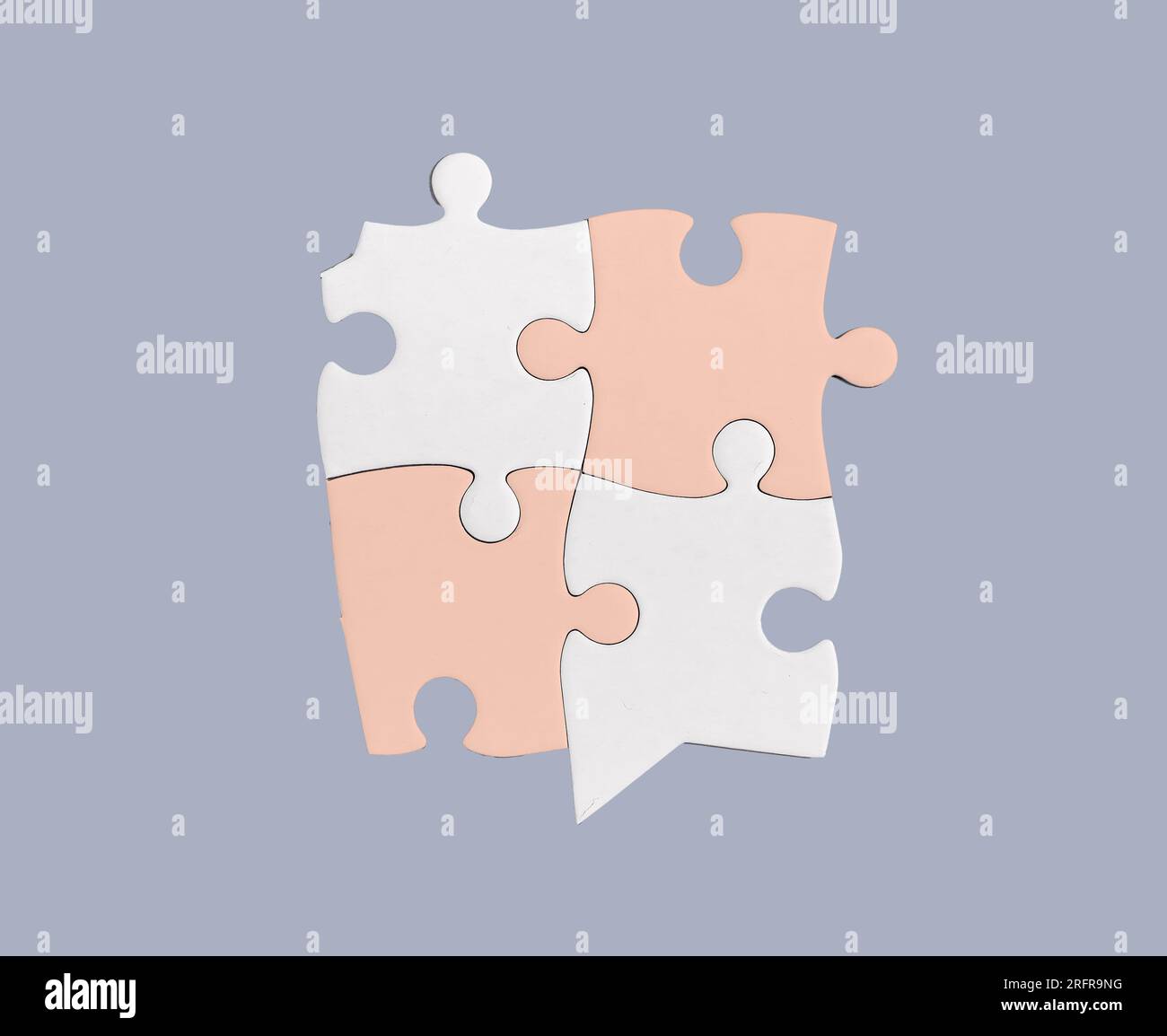 Four puzzle pieces connected together Stock Photo - Alamy