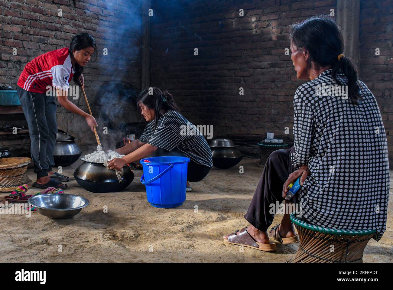 Kuki women prepare food for volunteers protecting the border from the ...