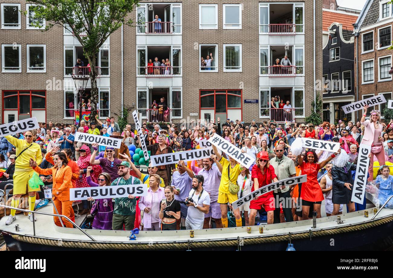 AMSTERDAM - Spectators during the Canal Parade. The boat parade with ...