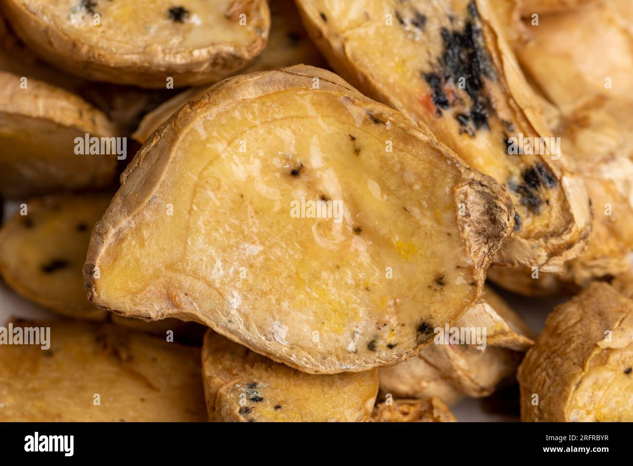 Spoiled and covered with mold sliced ginger, spices spoiled food ...