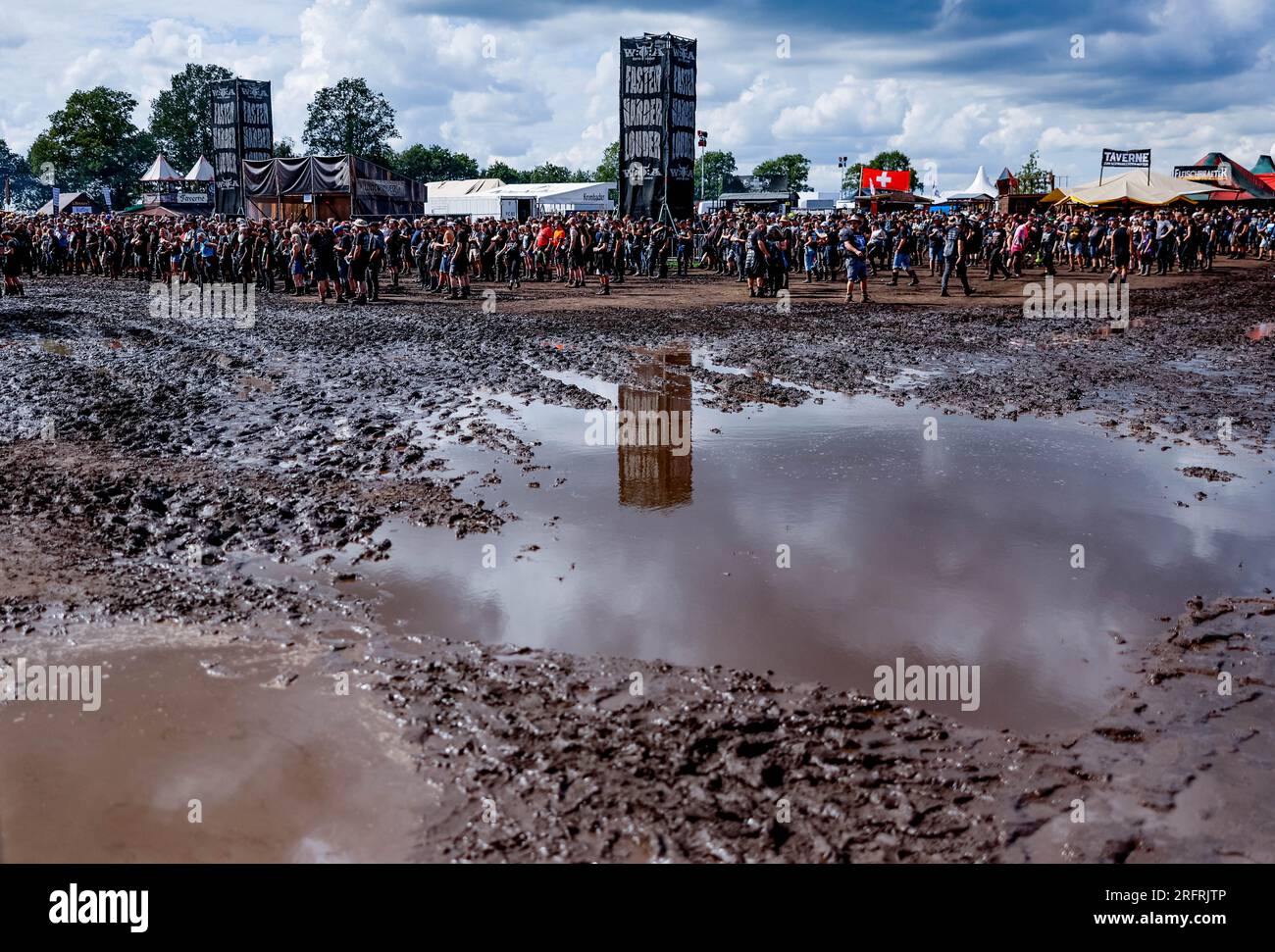 Wacken, Germany. 05th Aug, 2023. Puddles of mud cover the festival ...